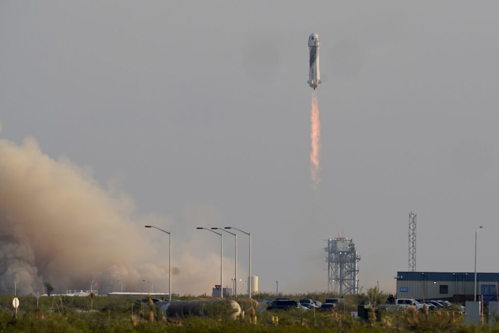 Bezos riding own rocket on company’s 1st flight with people - The ...